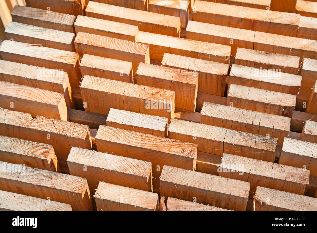 Stack of new wooden studs at the lumber yard Stock Photo - Alamy