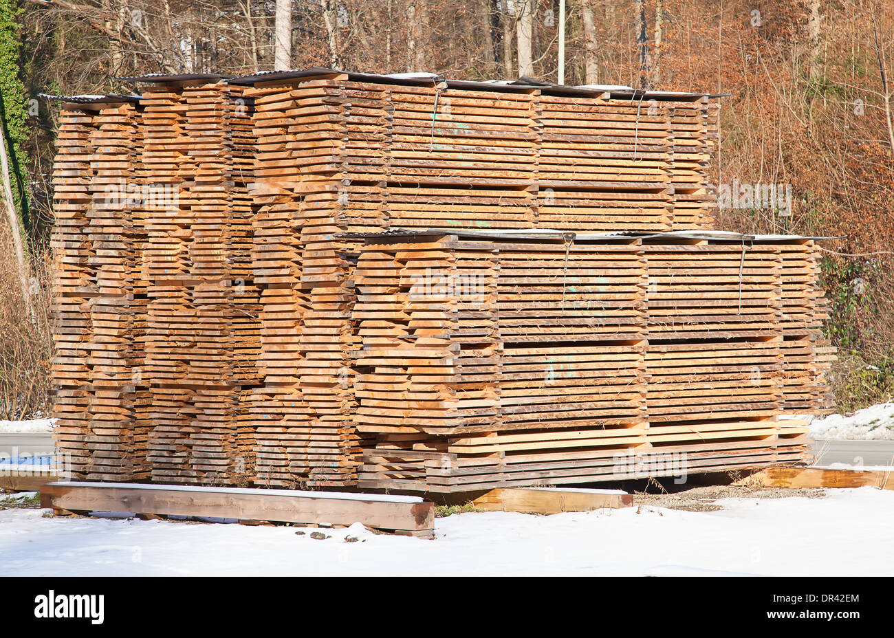 Stack of new wooden studs at the lumber yard Stock Photo - Alamy