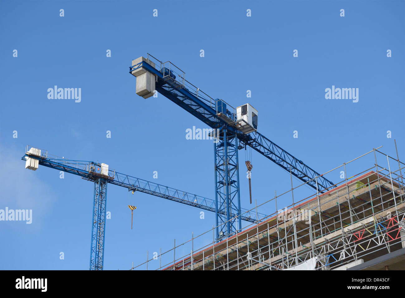 construction site showing static crane and scaffolding on the beachside ...