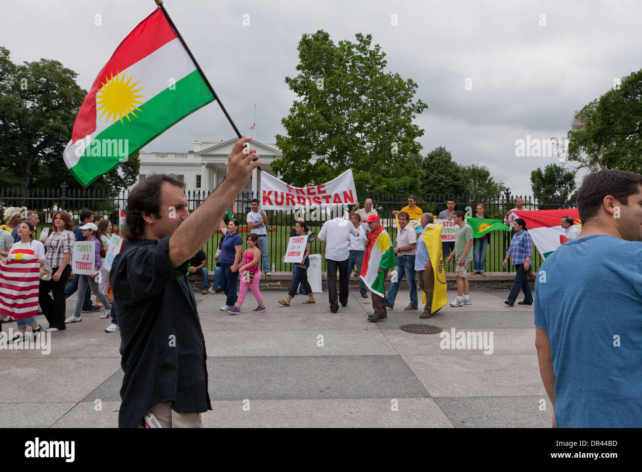 American Kurds hold up a Kurdish flag in front of the White House Stock ...
