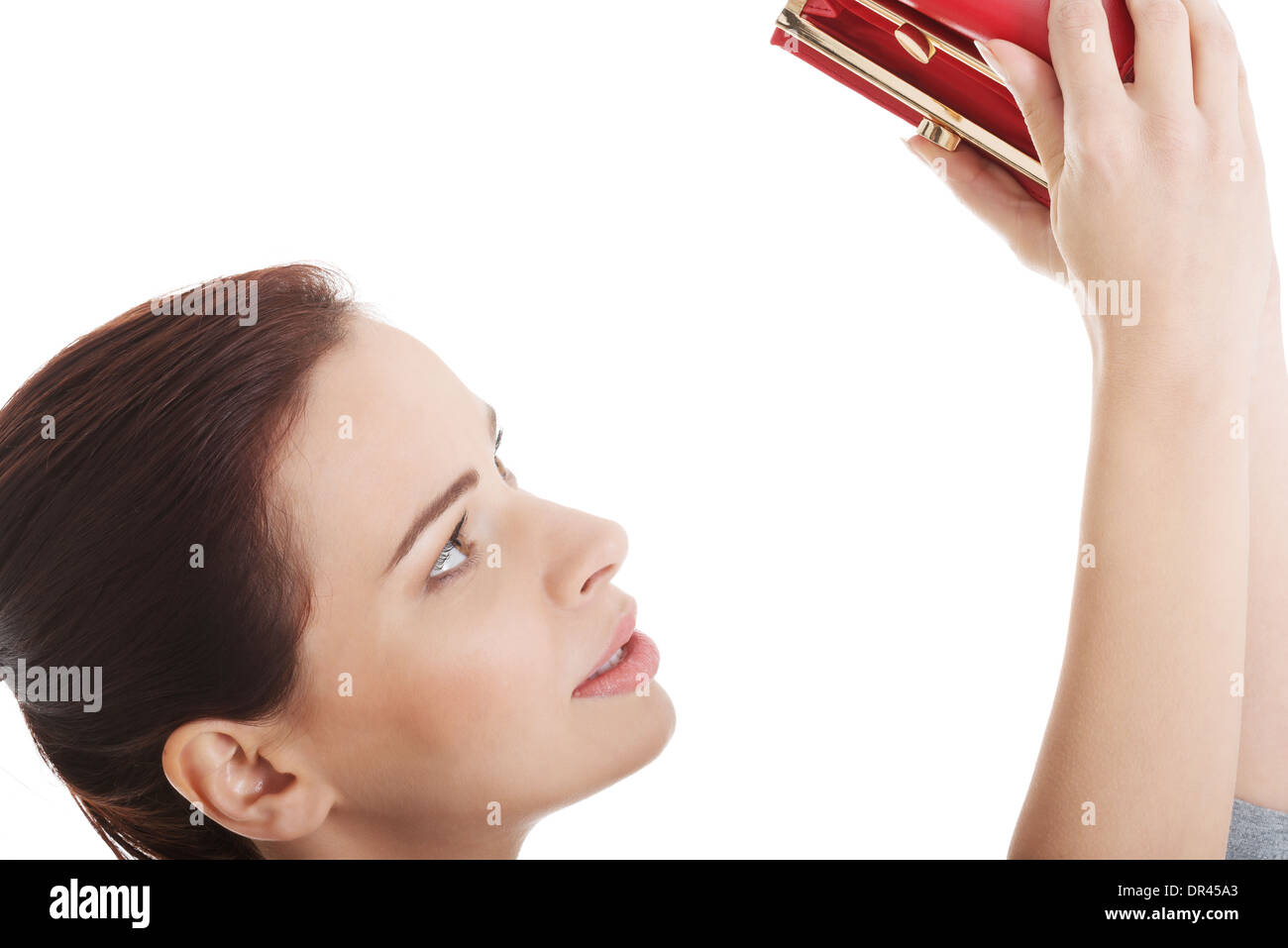 Beautiful casual woman showing her empty wallet. Isolated on white ...