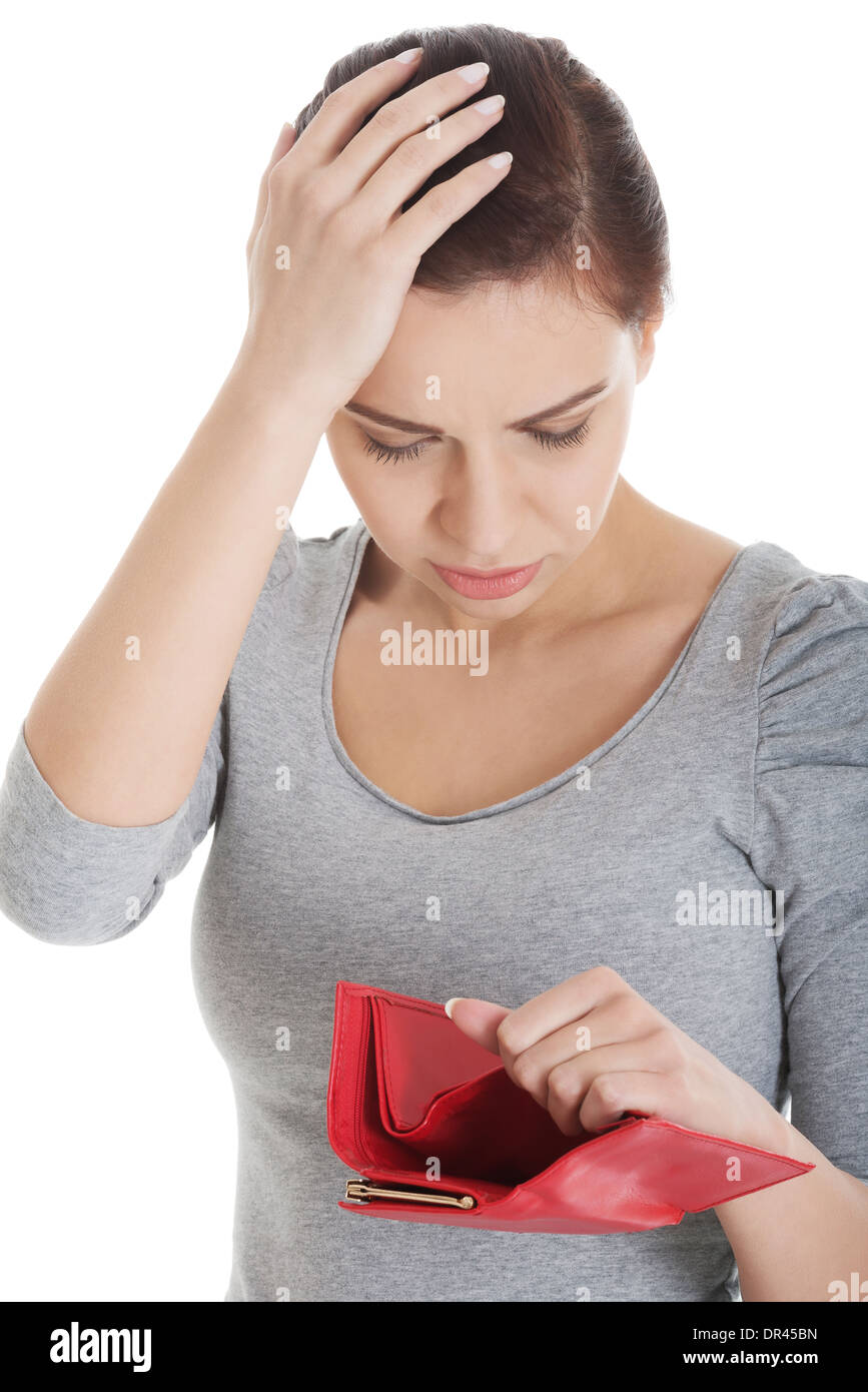 Beautiful casual woman showing her empty wallet. Isolated on white ...