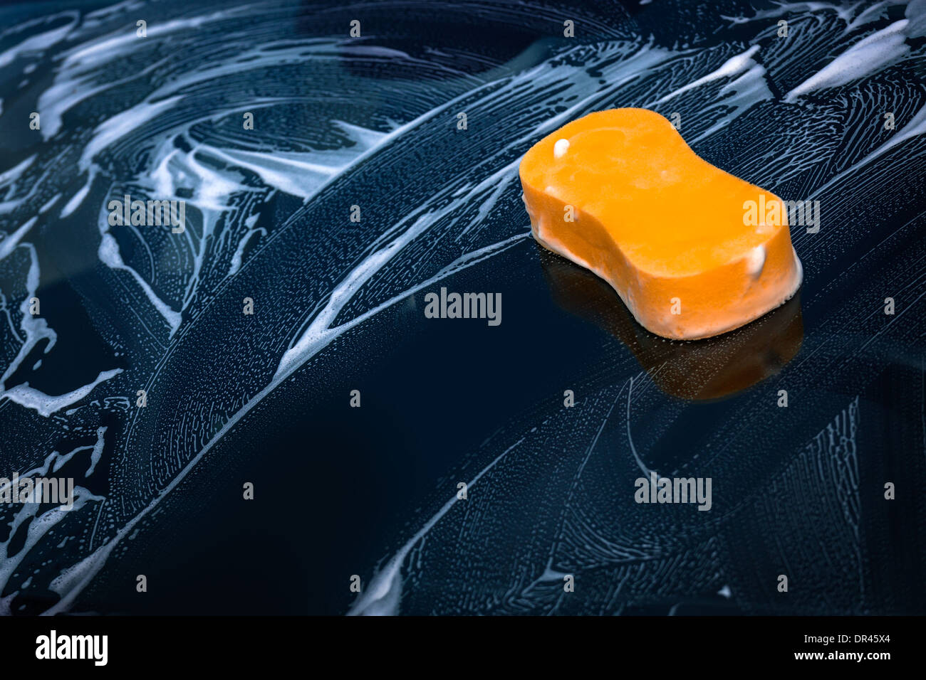 sponge over the car for washing Stock Photo - Alamy