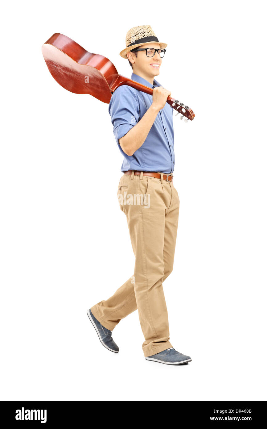 Male holding guitar over shoulder hi-res stock photography and images ...
