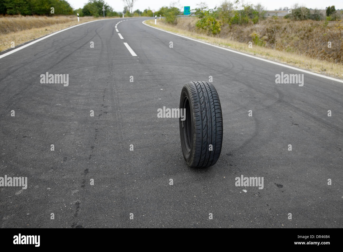 Wheel on road Stock Photo - Alamy