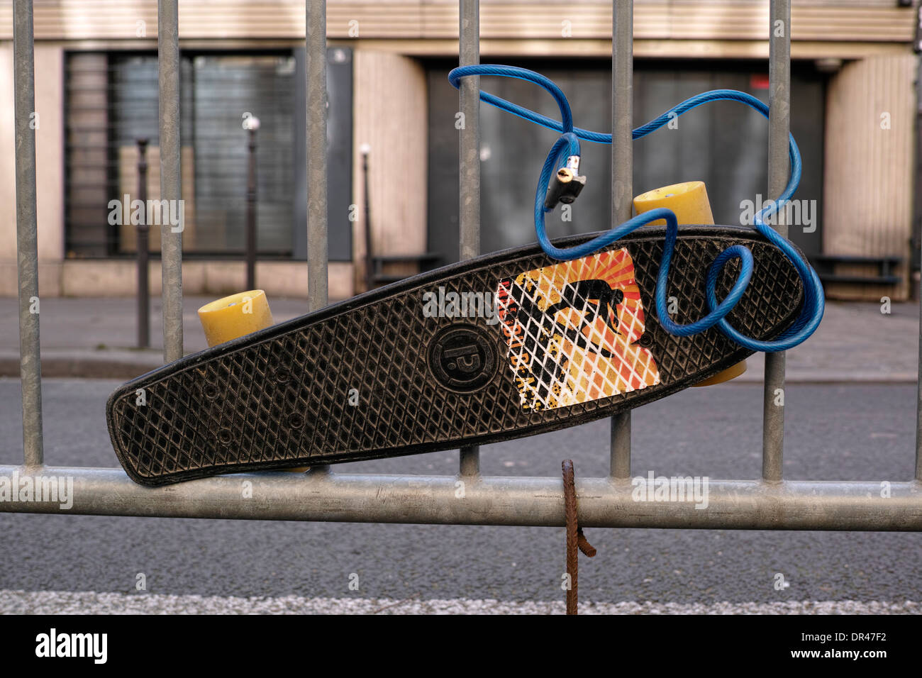 Locked skateboard, Paris, France Stock Photo - Alamy