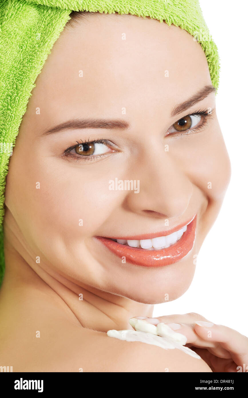 Beautiful woman applying body lotion on arm. Spa concept Stock Photo ...