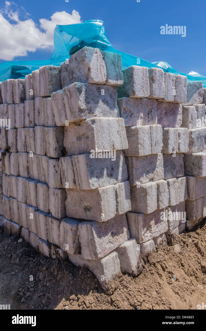 Salt blocks quarried from the Salar de Uyuni stacked waiting to be used ...