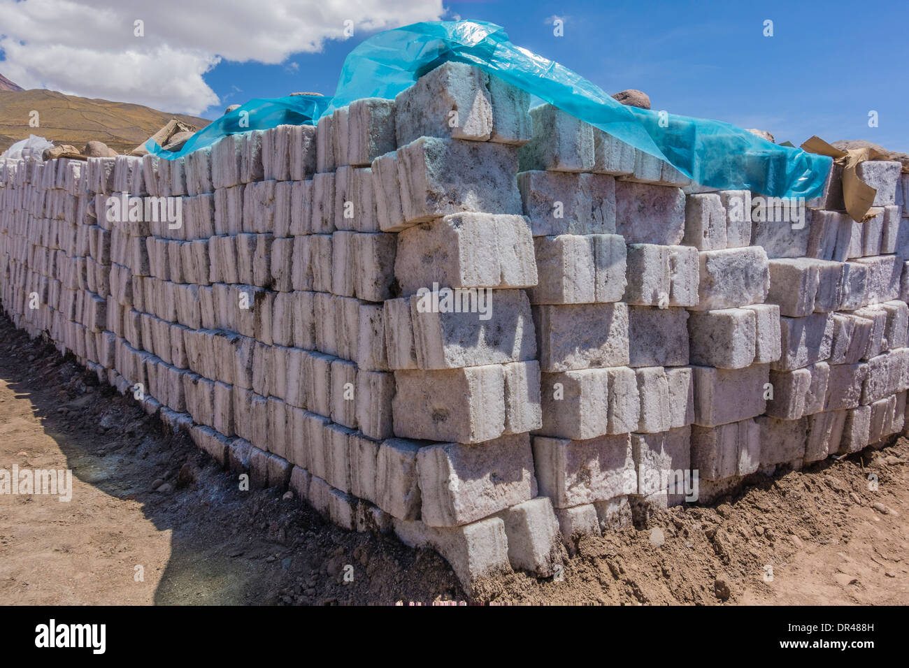 Salt blocks quarried from the Salar de Uyuni stacked waiting to be used ...