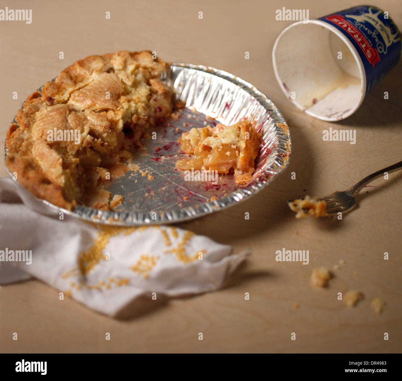 Messy half eaten apple pie Stock Photo - Alamy