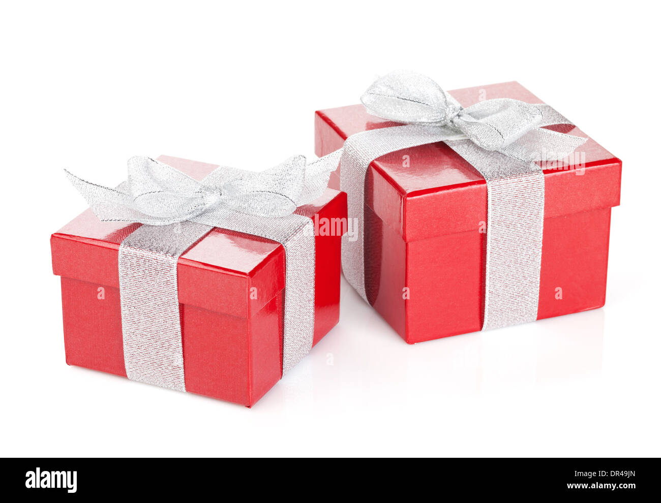 Two red gift boxes with silver ribbon and bow. Isolated on white ...