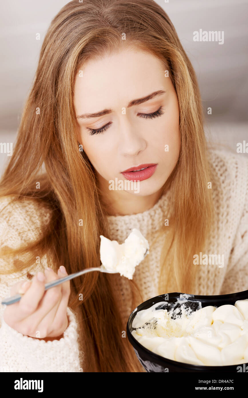 Binge eating ice cream hi-res stock photography and images - Alamy