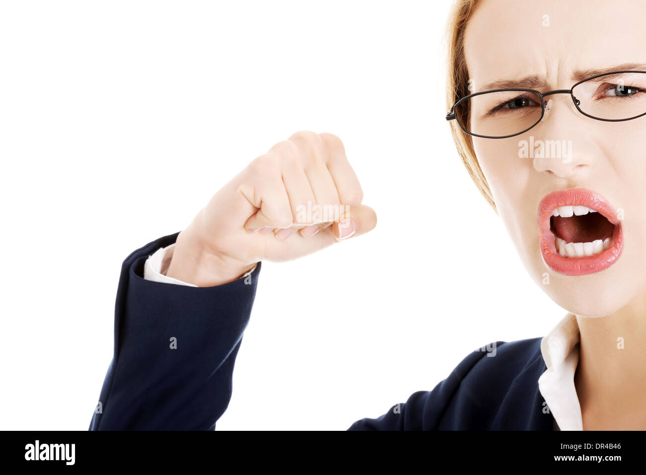 Furious angry business woman trying to punch you. Isolated on white ...