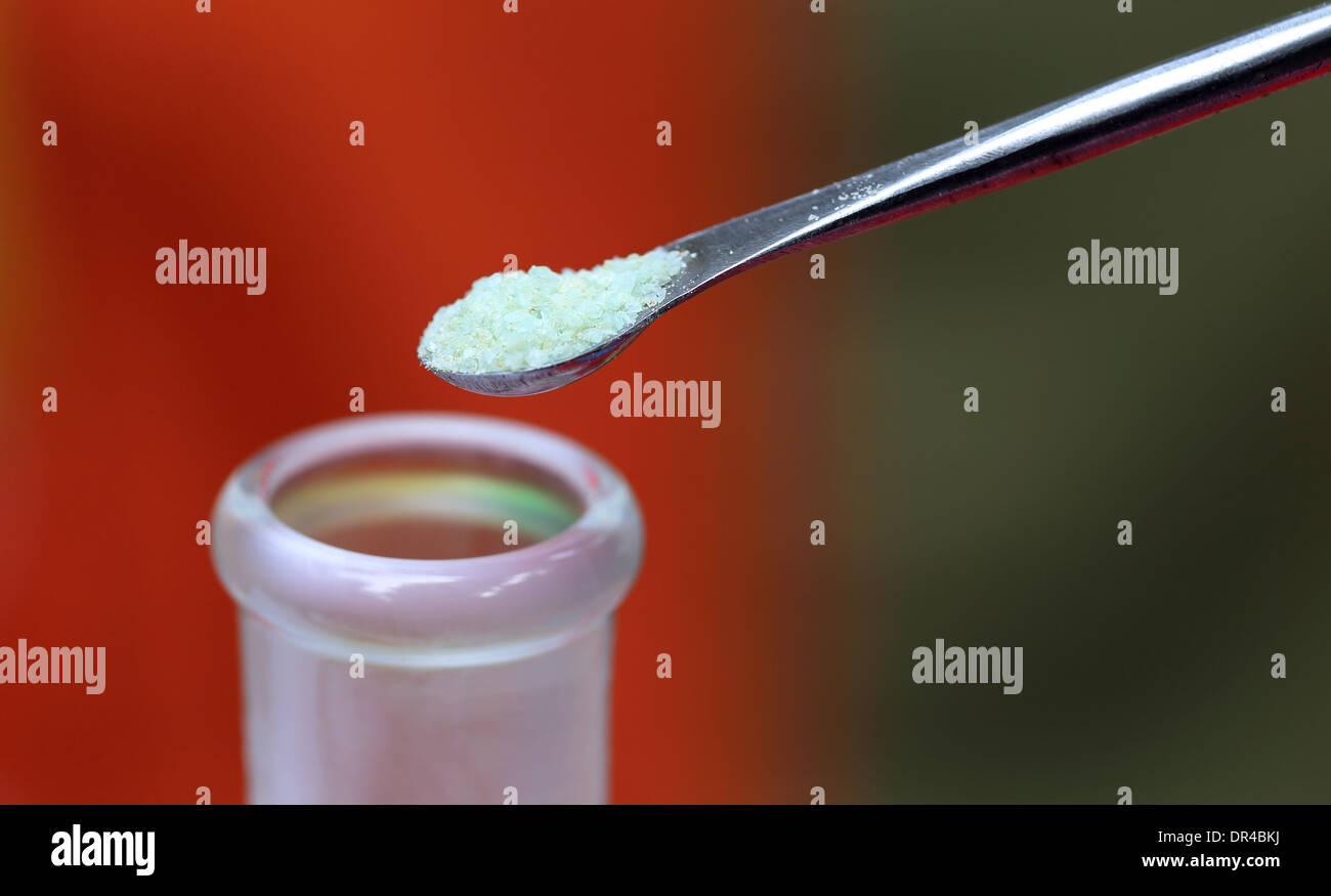 Ferrous sulphate with a steel spatula near a test tube Stock Photo - Alamy