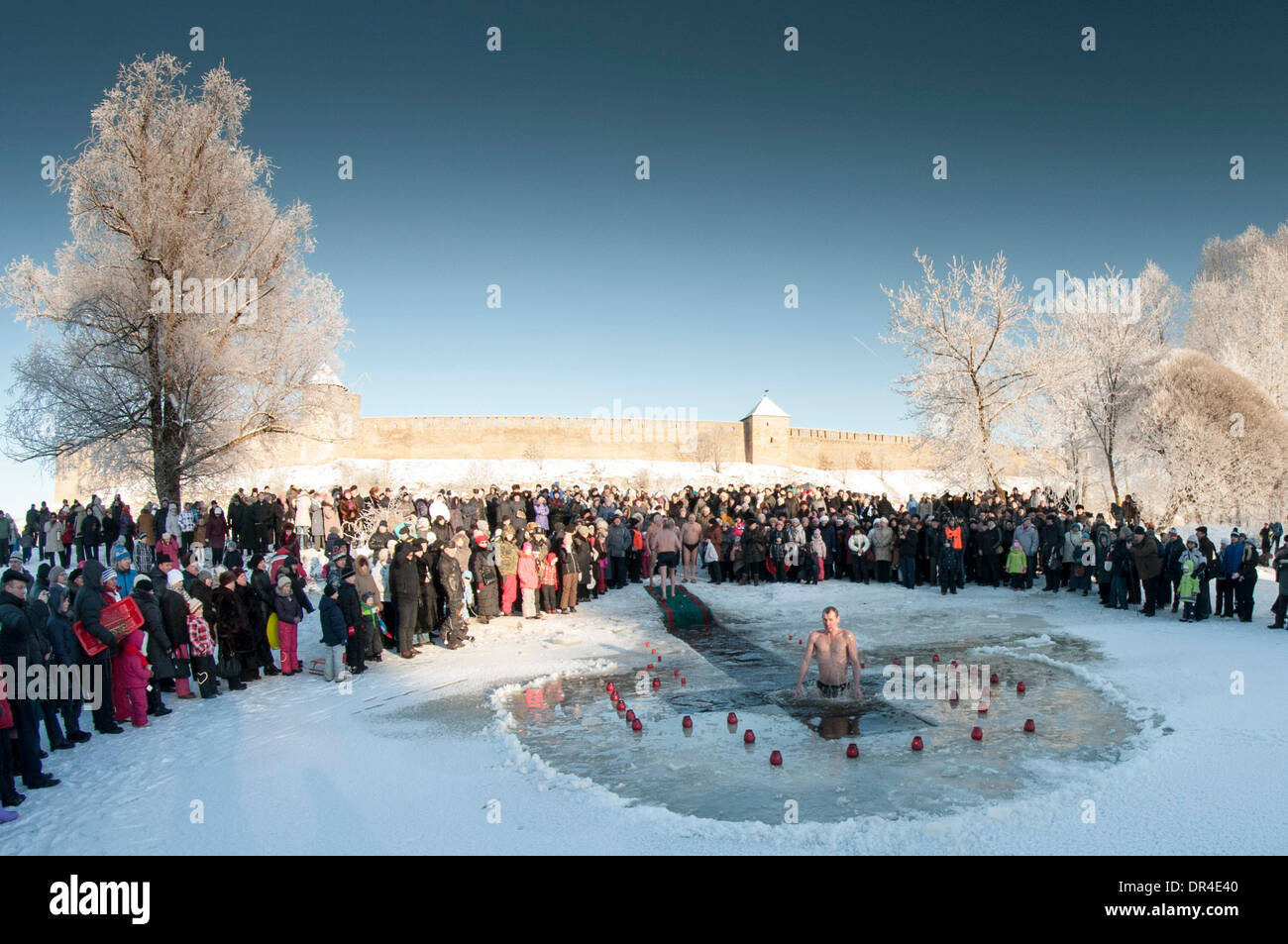 Narva, Estonia. 19th Jan, 1914. A Russian Orthodox believer takes an ...
