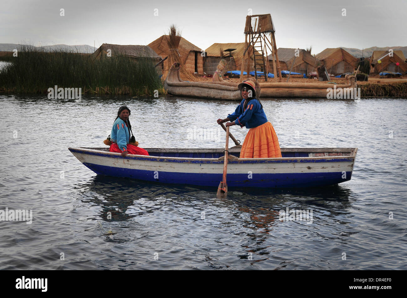 Two women on boat in Peru Stock Photo - Alamy