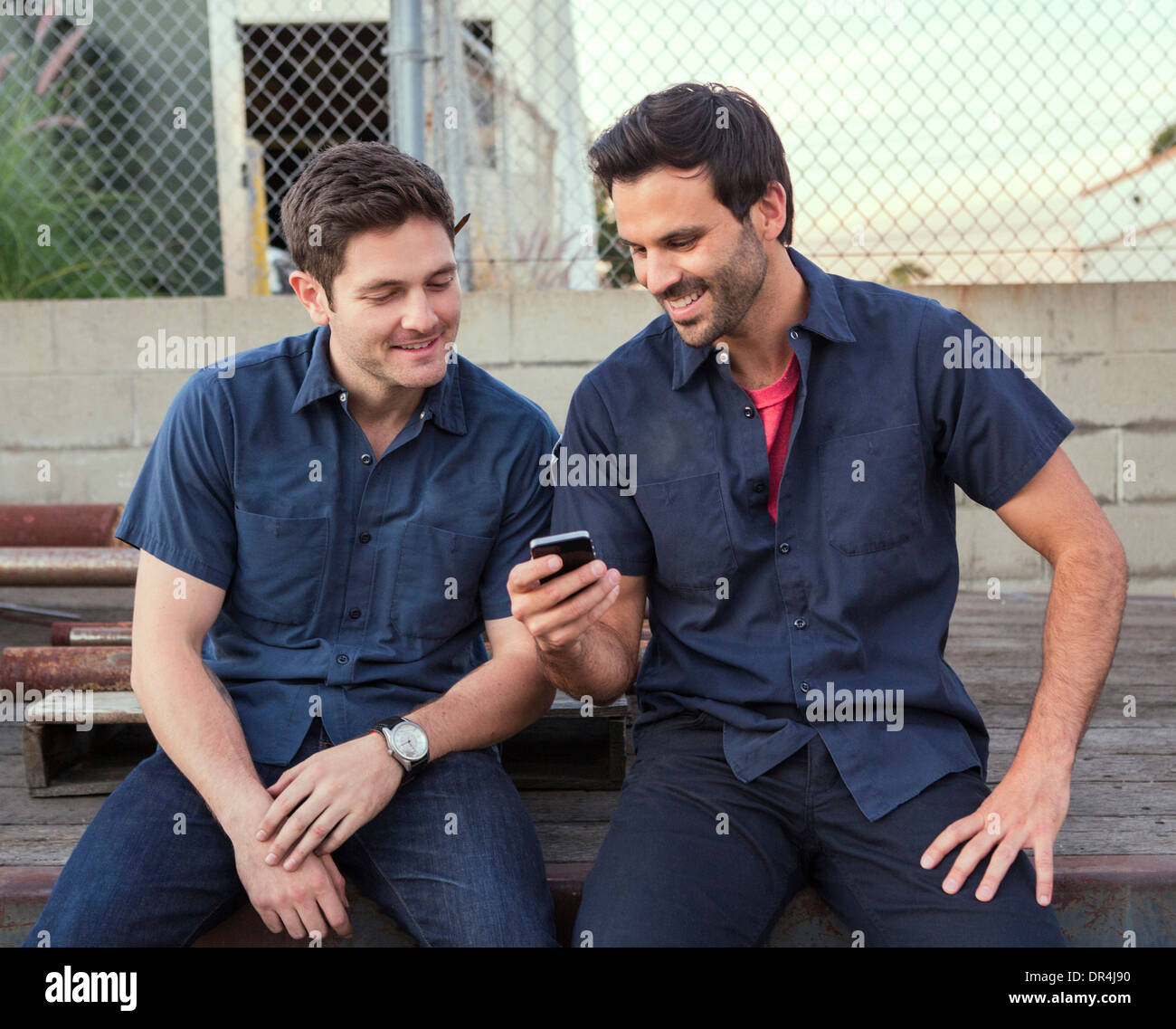Men at the phone hi-res stock photography and images - Alamy