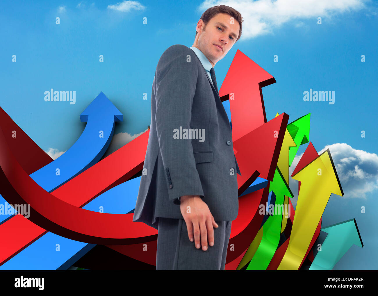 Composite image of stern businessman standing Stock Photo - Alamy