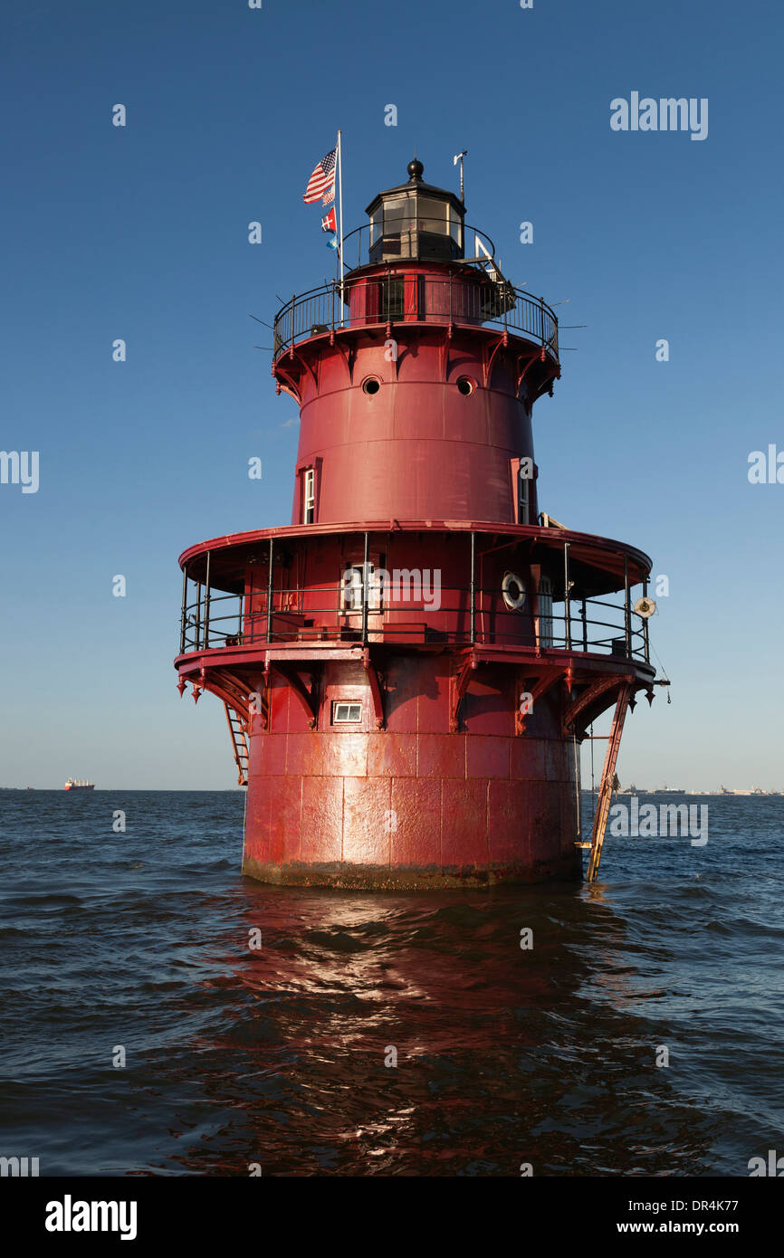 Lighthouse in ocean Stock Photo - Alamy