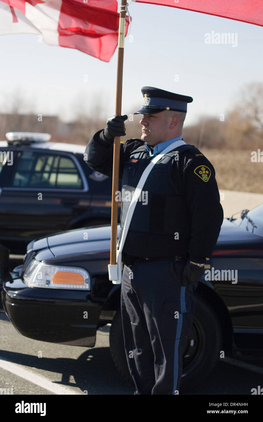 Mar 23, 2009 - Whitby, Ontario, Canada - The OPP perform an honor guard ...