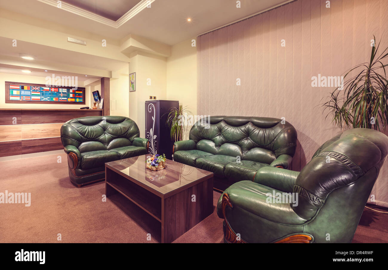 Interior and details of a small hotel reception Stock Photo - Alamy