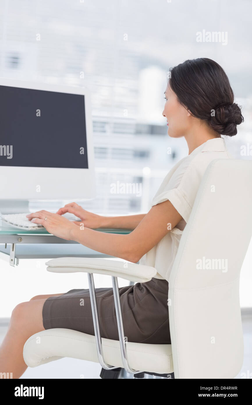 Asian businesswoman using computer in hi-res stock photography and ...