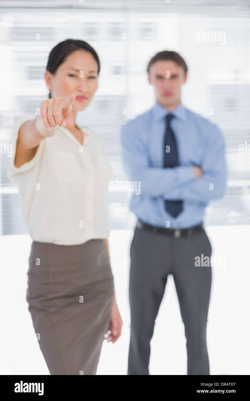 Professional young man pointing camera hi-res stock photography and ...