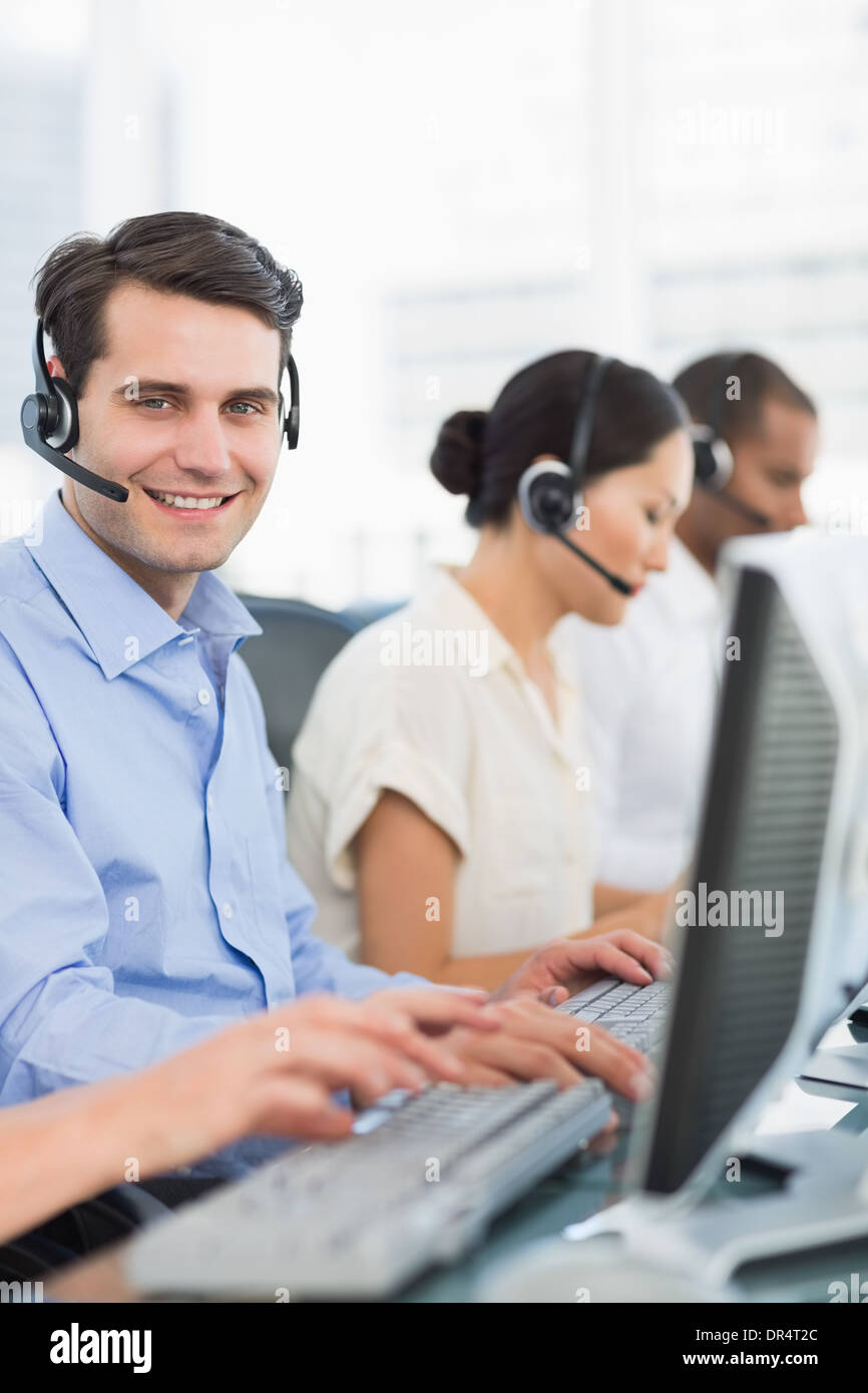 Business colleagues computers headset hi-res stock photography and ...
