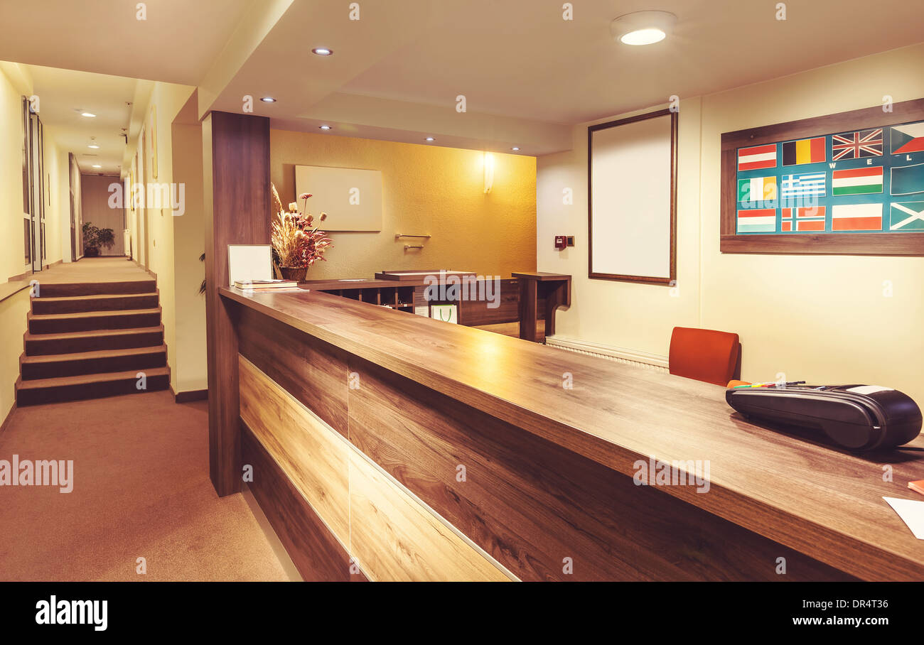 Interior and details of a small hotel reception Stock Photo - Alamy