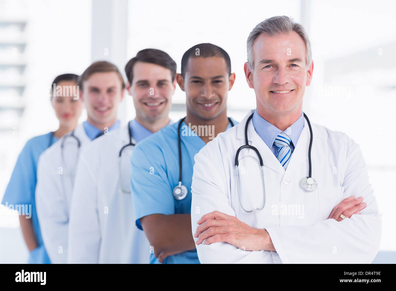 Doctors standing in a row at hospital Stock Photo - Alamy
