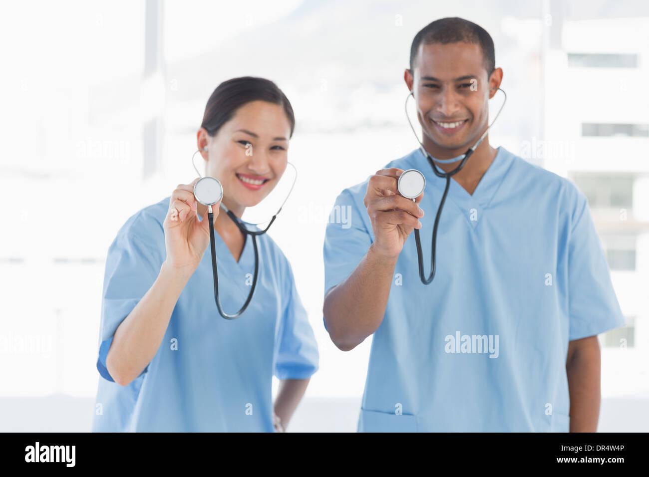 Doctors with stethoscopes in hospital Stock Photo - Alamy