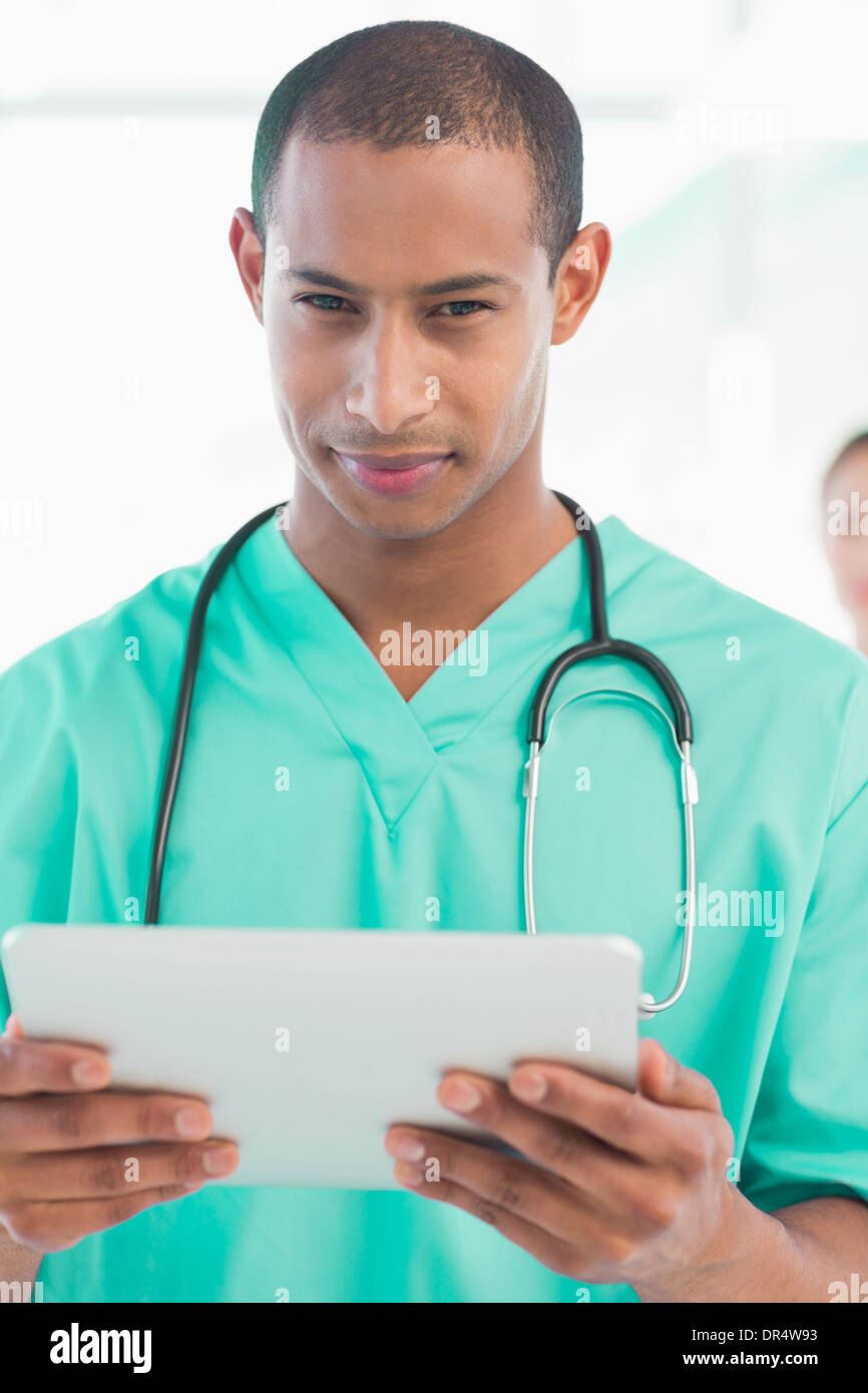 Male doctor stethoscope tablet hi-res stock photography and images - Alamy