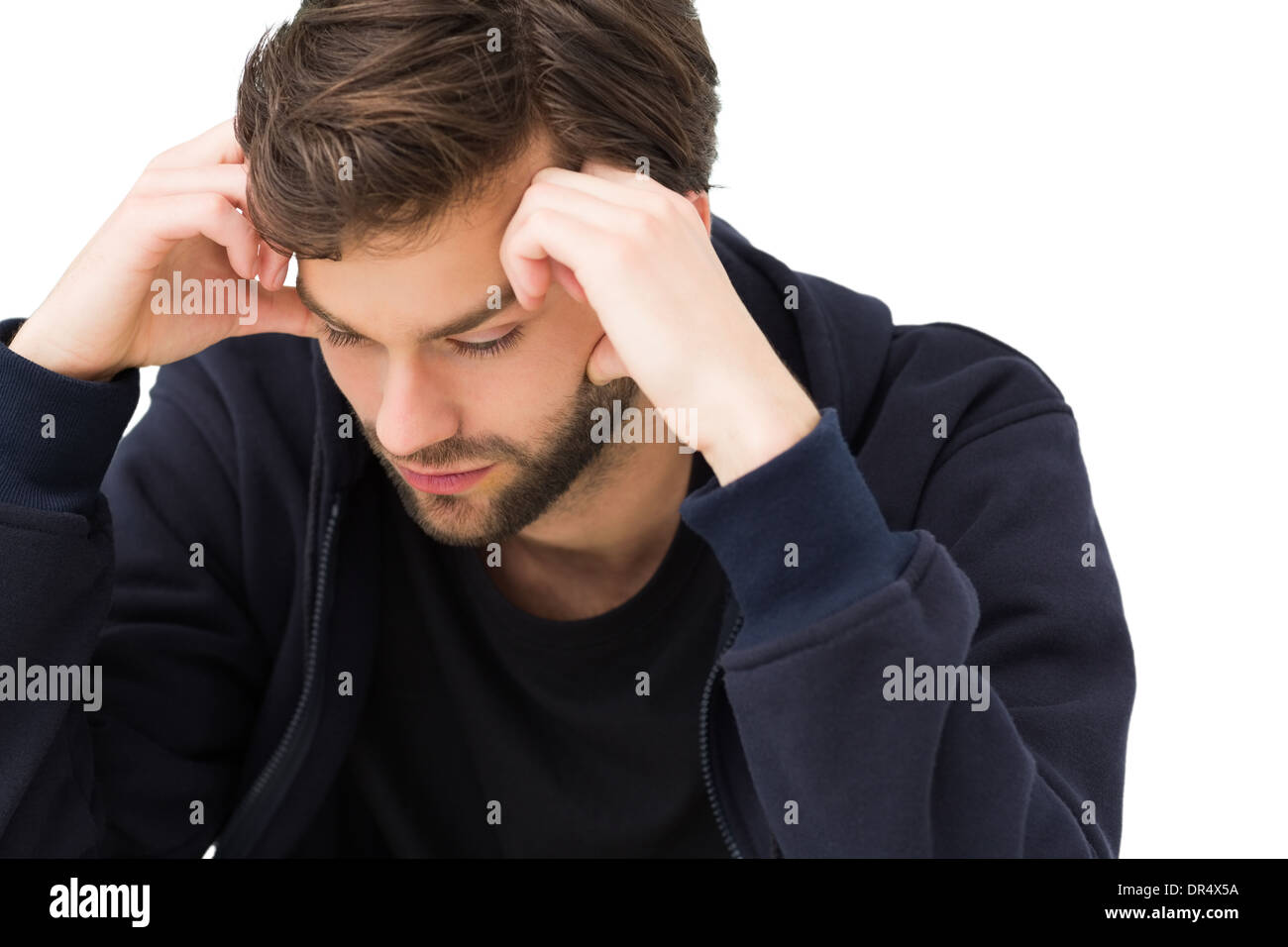 Close-up of a stressed handsome young man over white background Stock ...