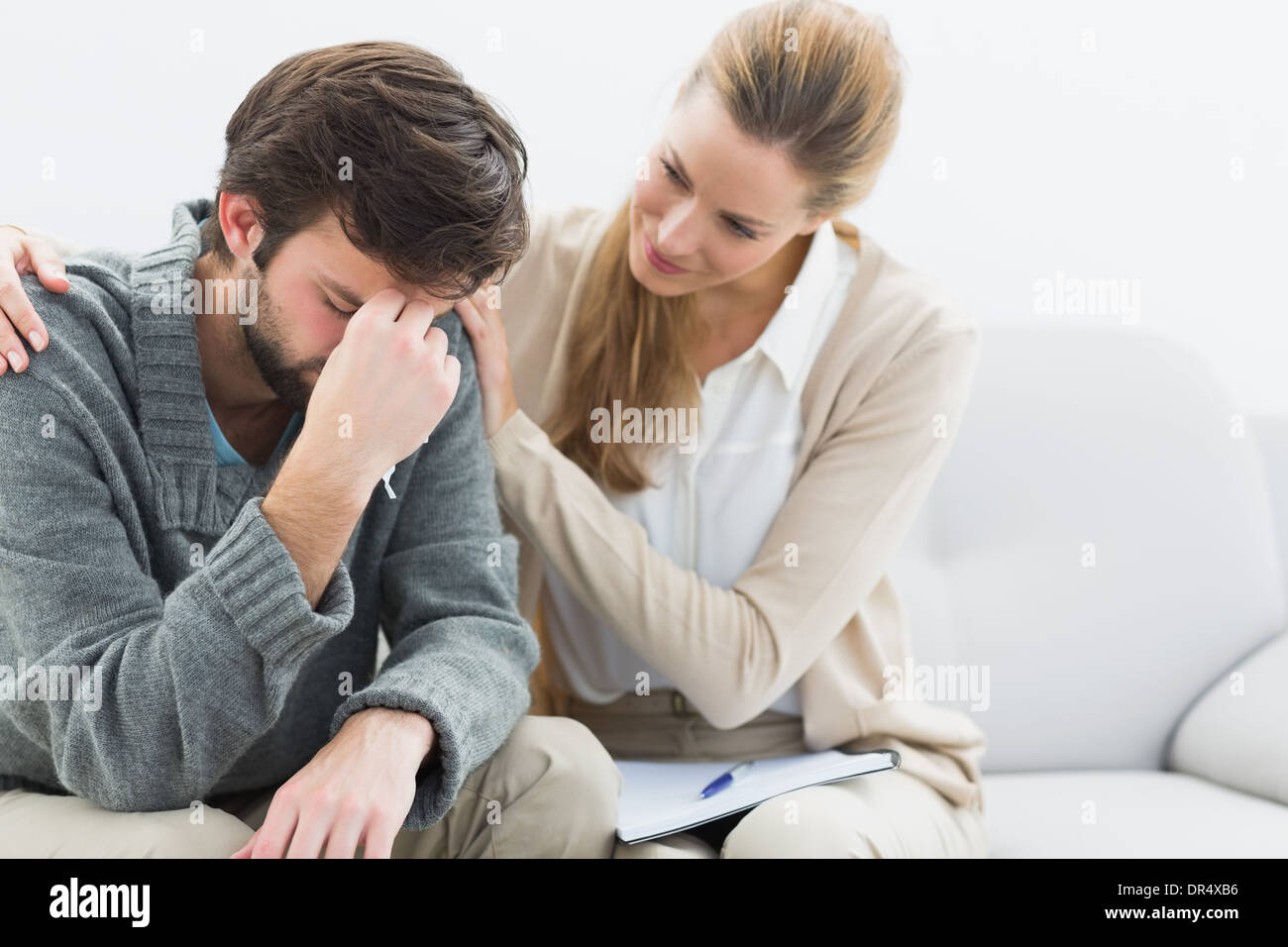 Young man in meeting with a financial adviser at home Stock Photo - Alamy