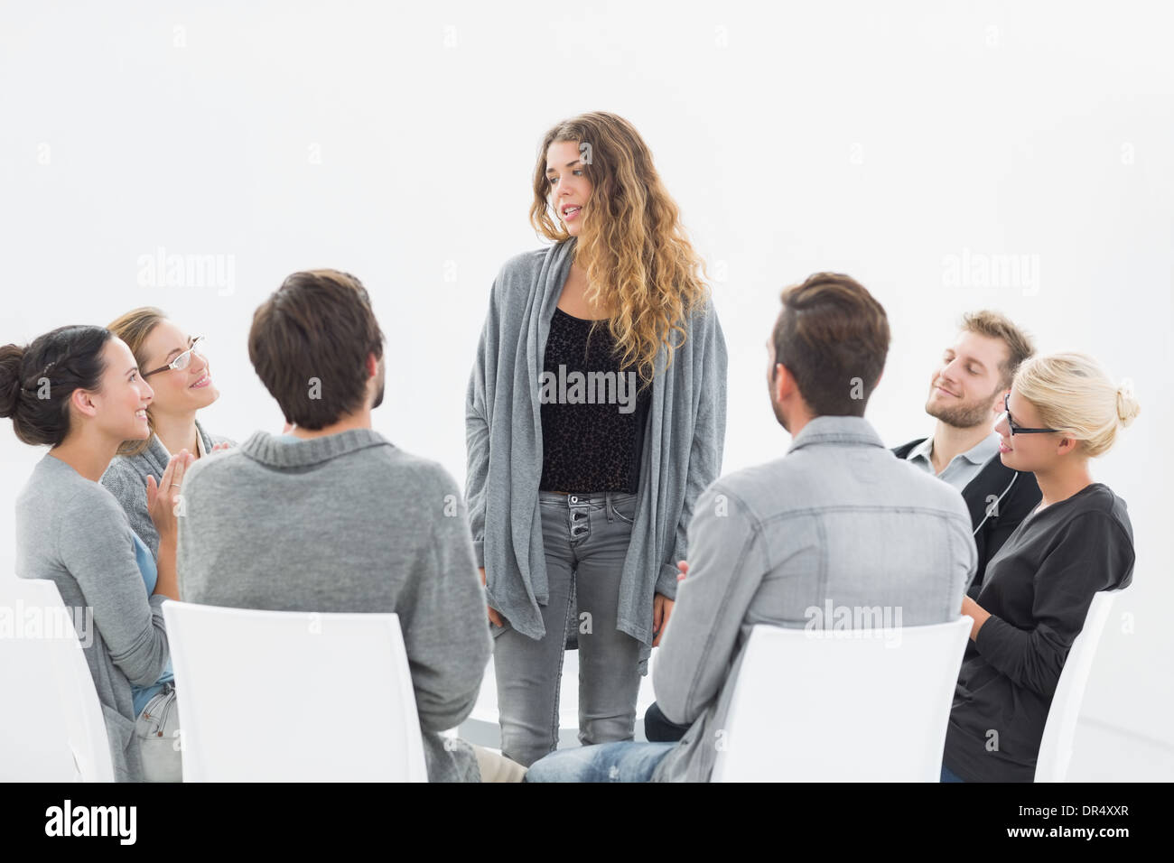 Group standing in circle hi-res stock photography and images - Alamy