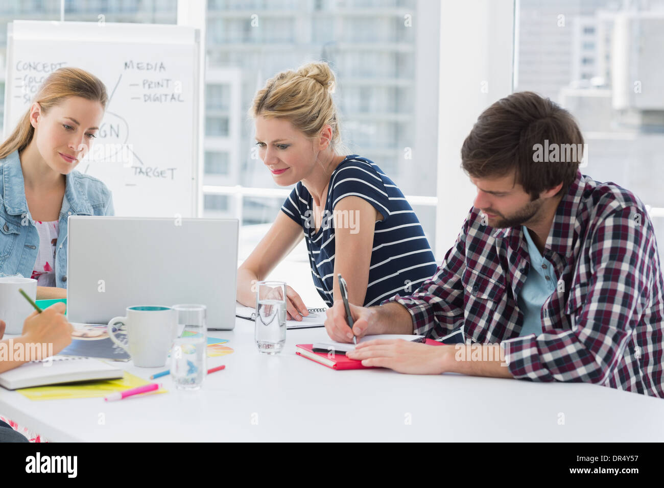 Business people working around table hi-res stock photography and ...