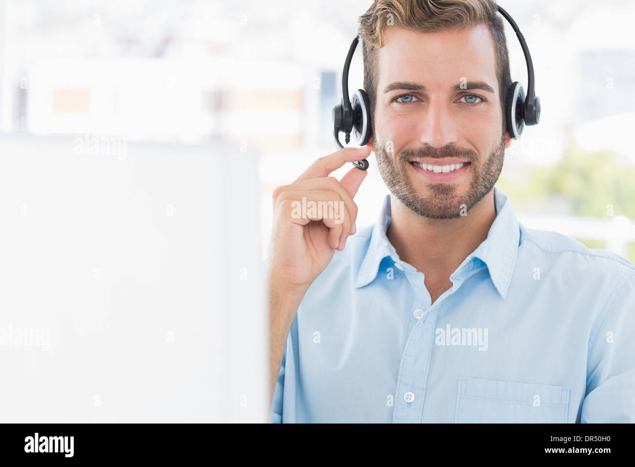 Call center young man hi-res stock photography and images - Alamy