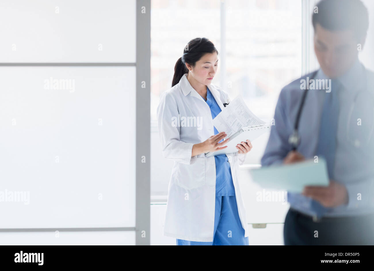 Doctors working in hospital Stock Photo - Alamy