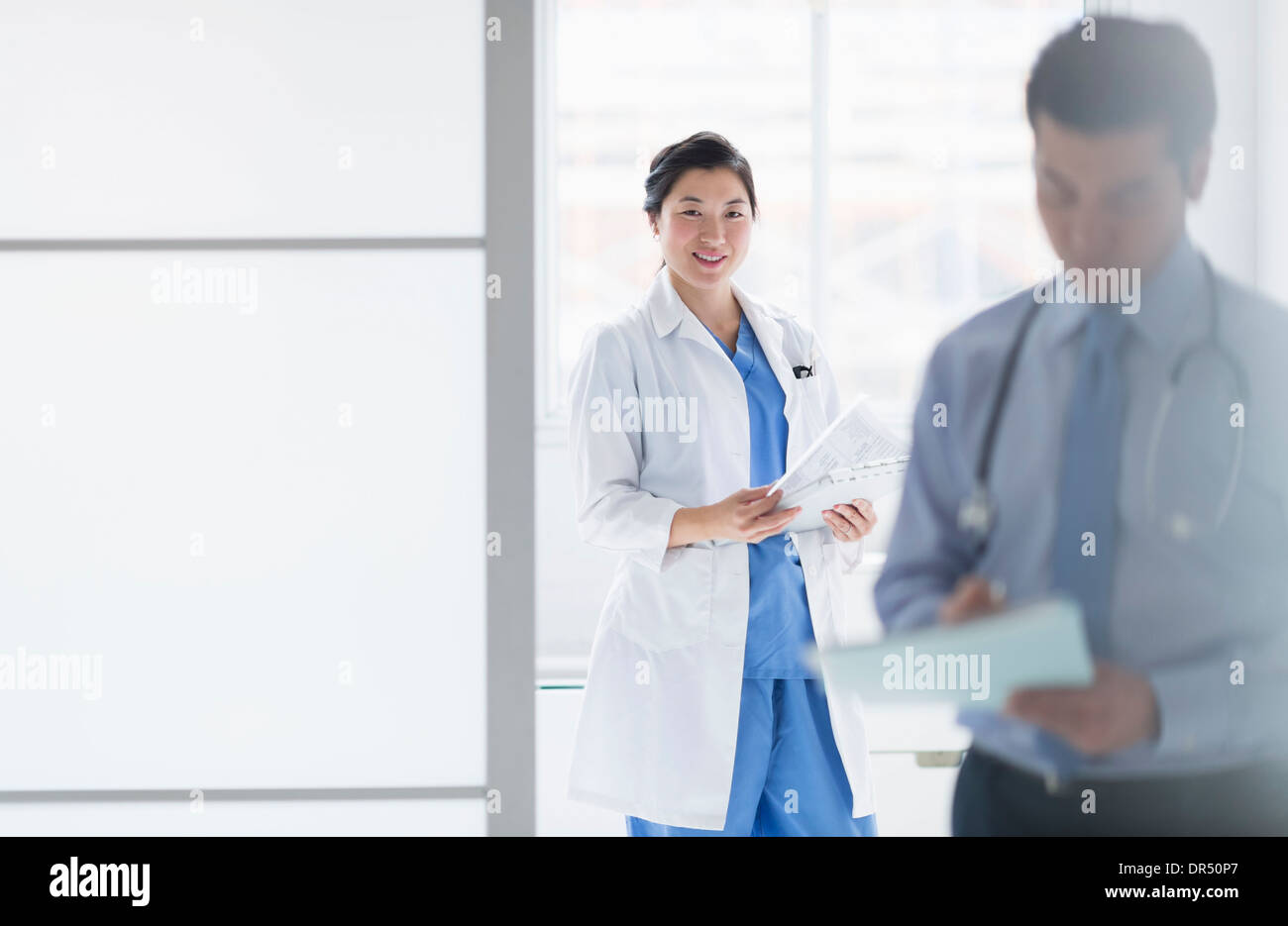 Doctors working in hospital Stock Photo - Alamy