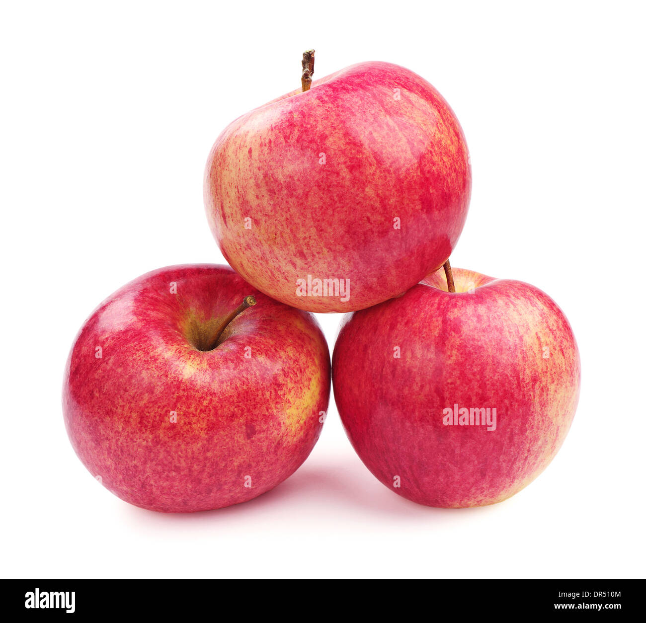 Three red apple on white background Stock Photo - Alamy