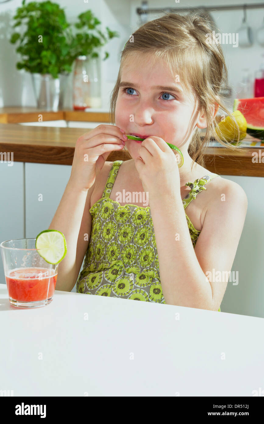 Girl sitting kitchen hi-res stock photography and images - Alamy