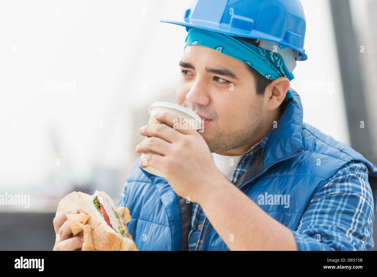 Blue collar worker eating hi-res stock photography and images - Alamy
