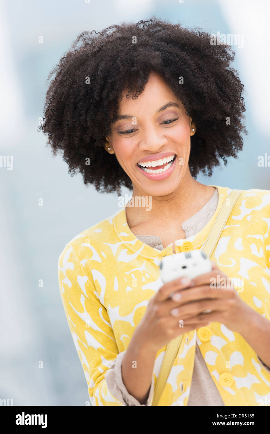 African American using cell phone Stock Photo - Alamy