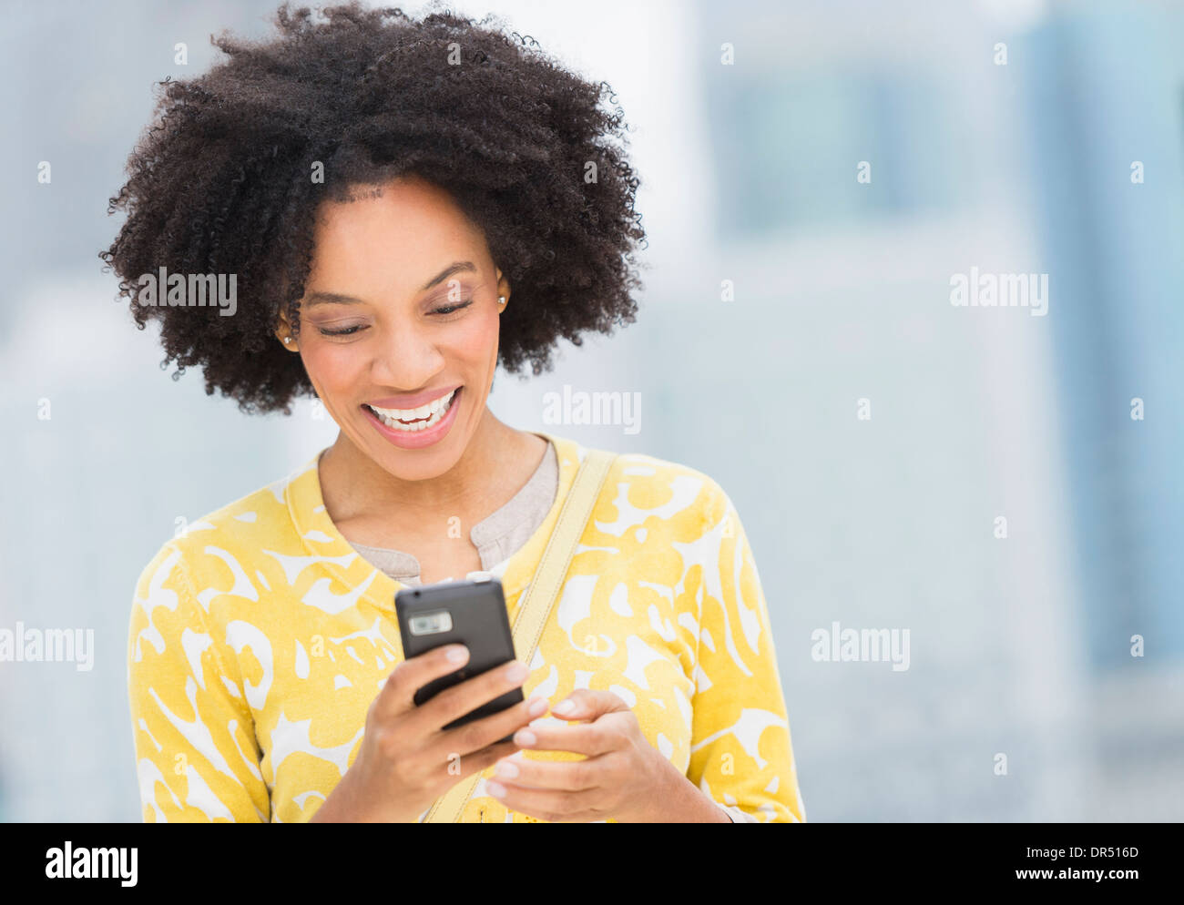 African American using cell phone Stock Photo - Alamy