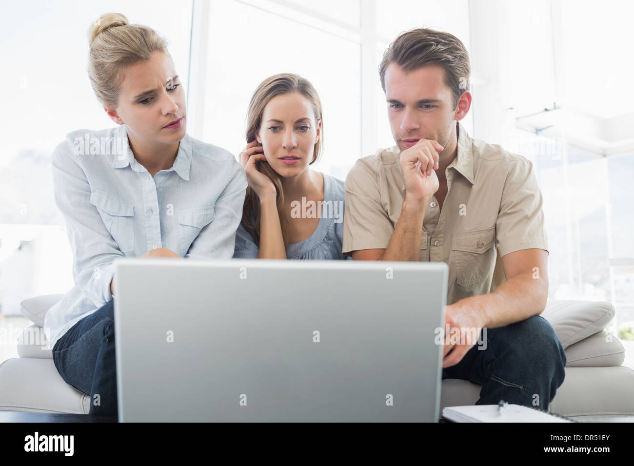 Three young people hi-res stock photography and images - Alamy