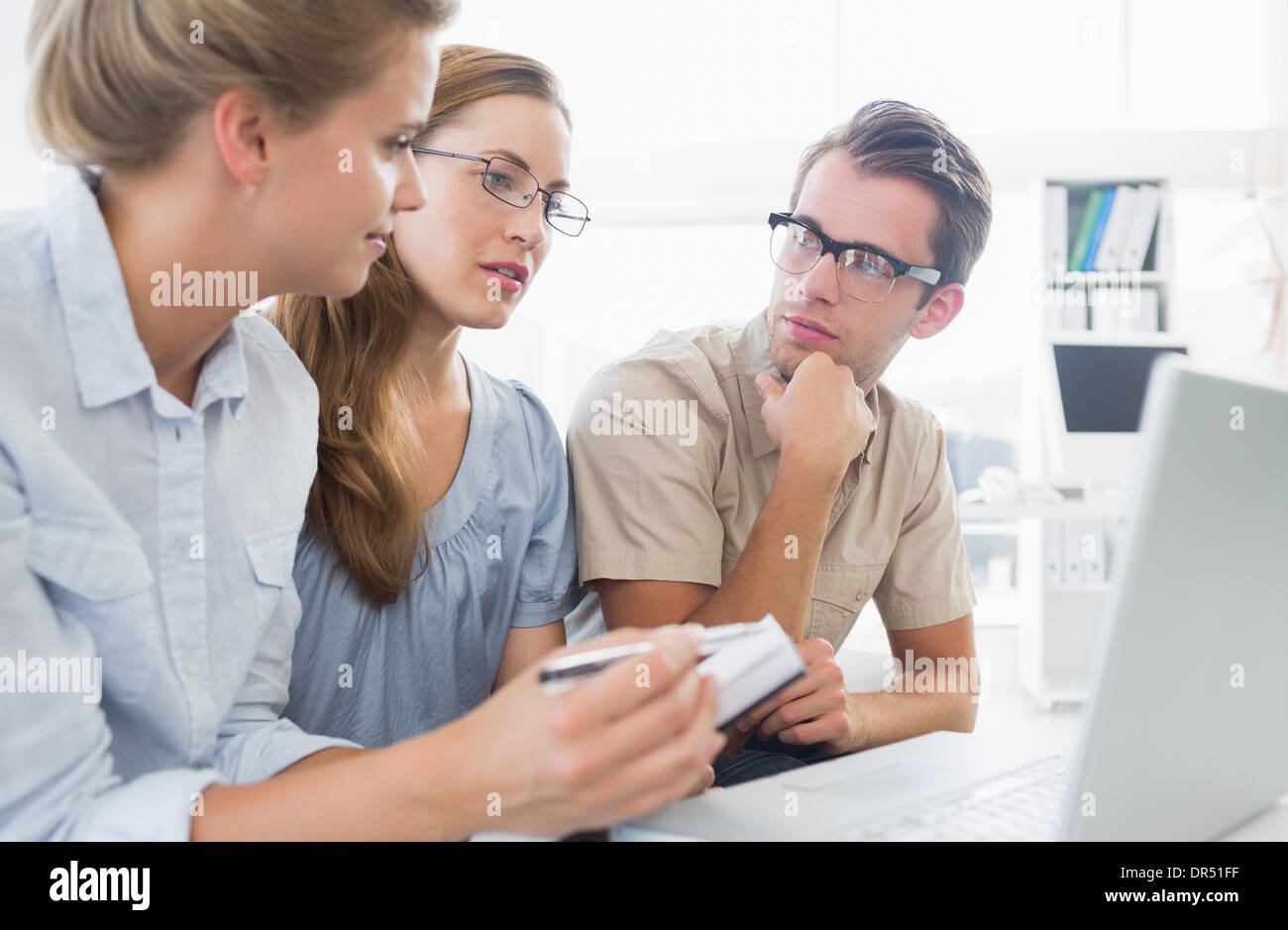 Young people working hi-res stock photography and images - Alamy