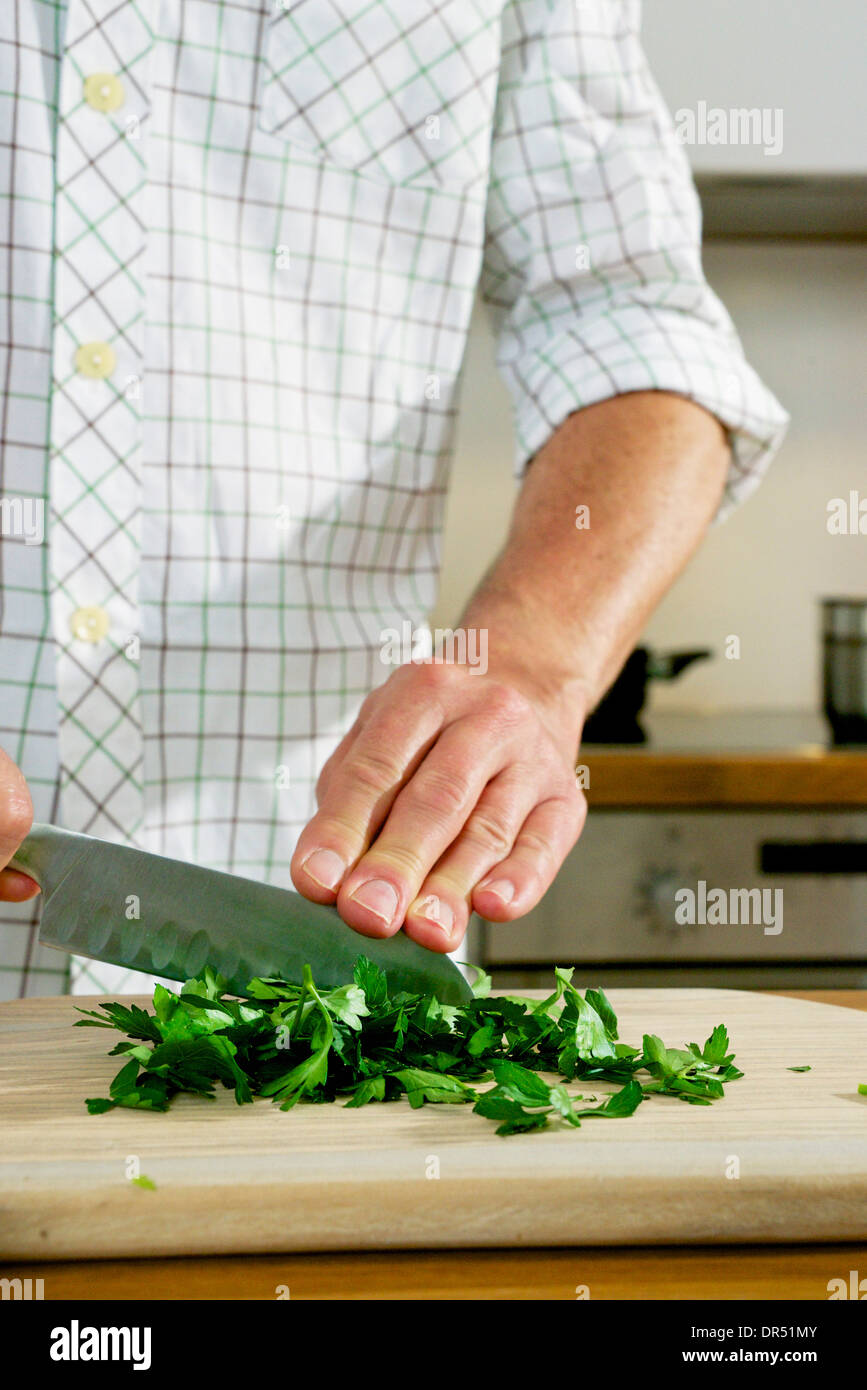 Cutting parsley hi-res stock photography and images - Alamy