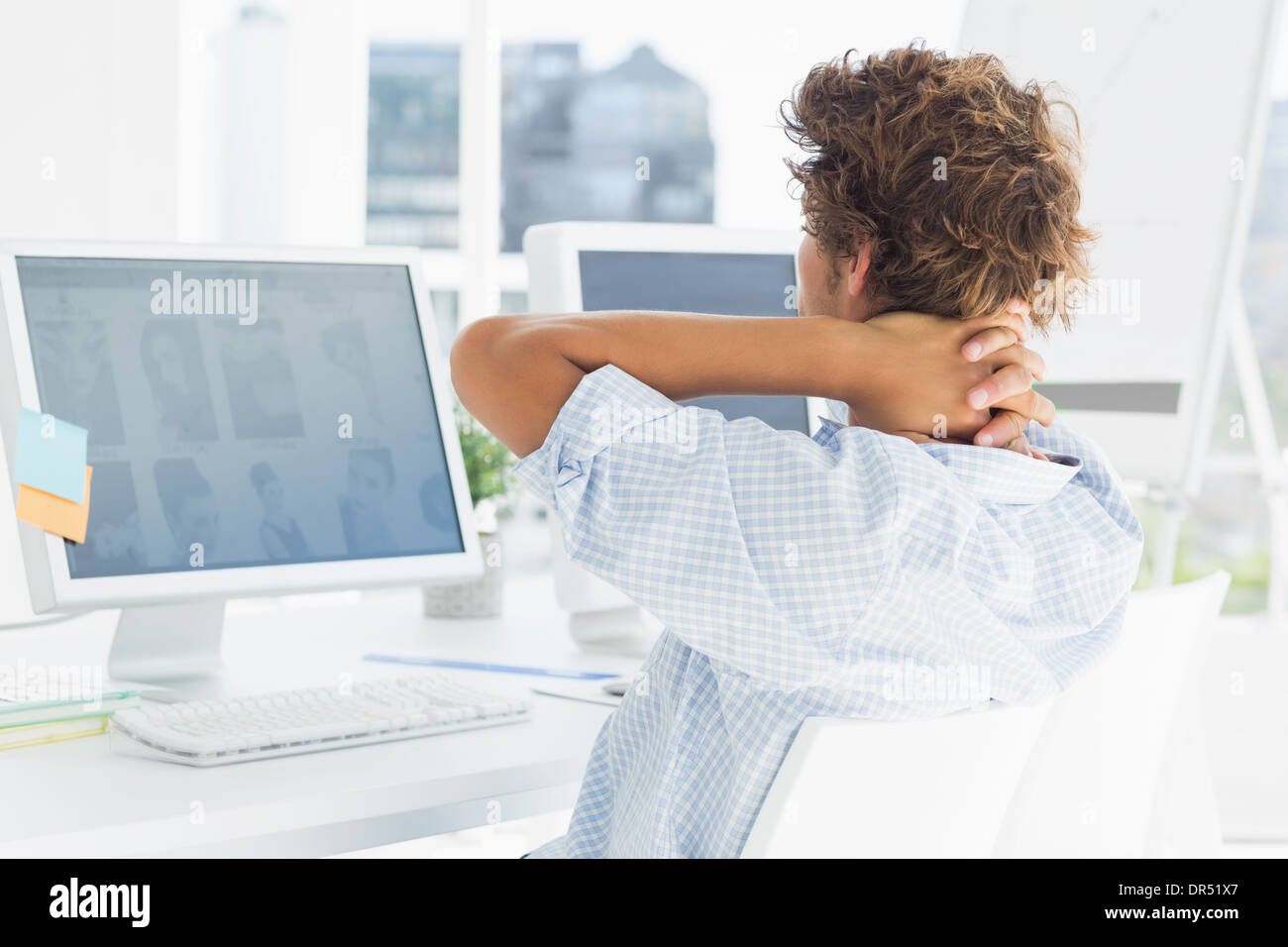 Business man behind monitor using hi-res stock photography and images ...