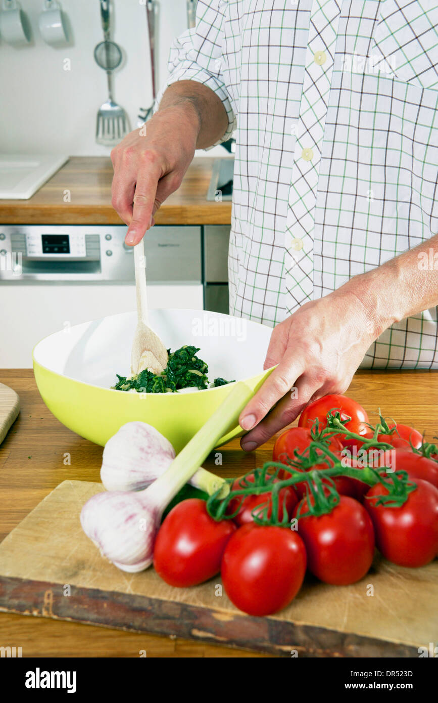 Person Cooking In Kitchen Stock Photo - Alamy