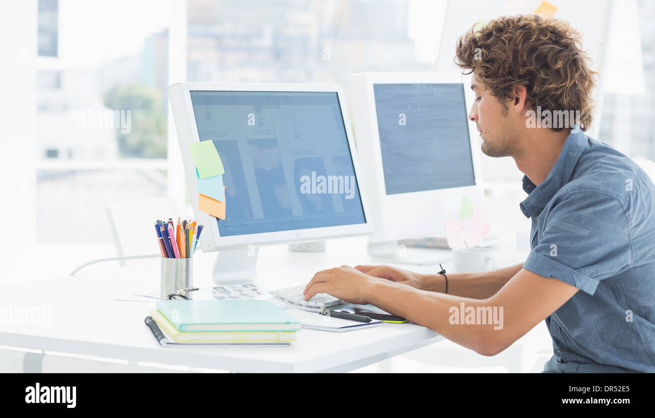 Office computer young man hi-res stock photography and images - Alamy
